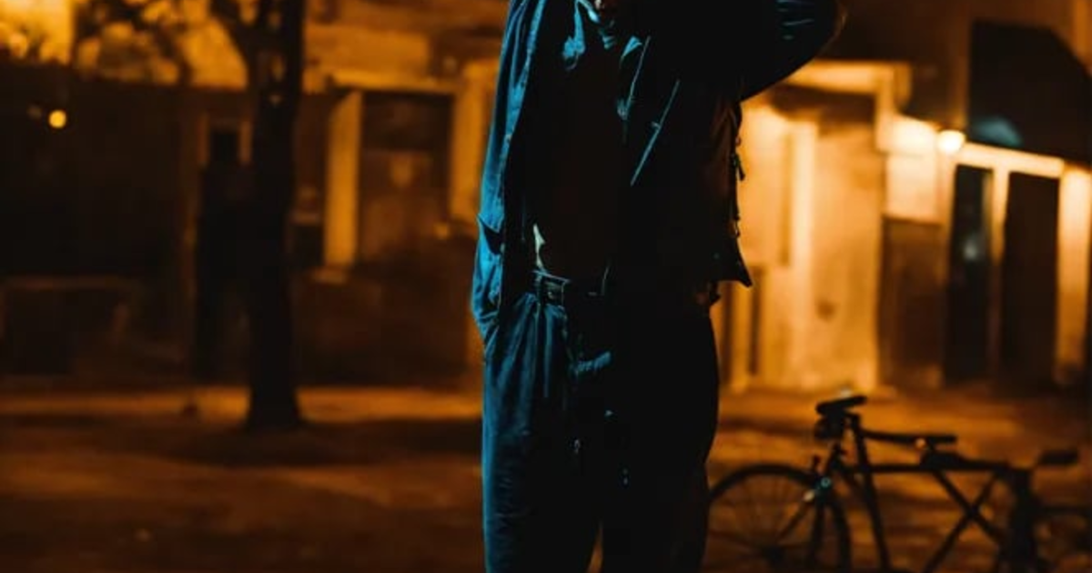 Lexica - Dead man hanging on ground in dark night